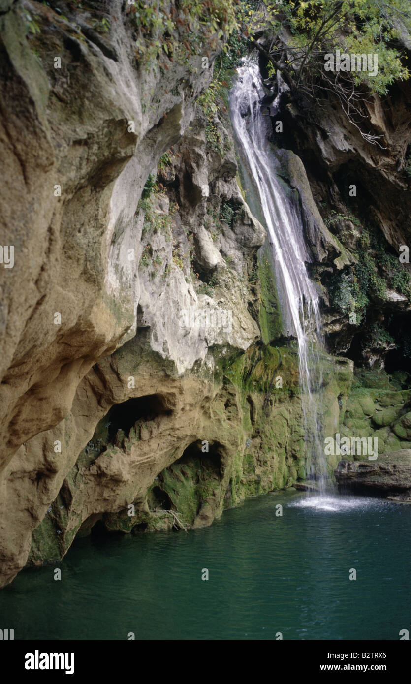 Cazorla national park Waterfall cascade of water down cliffs Into pool ...