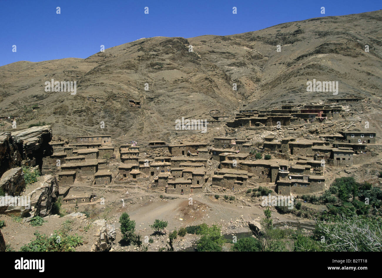 Kasbah town on hillside Mud walls buildings Landscape TIZI NÕTICHKA ...