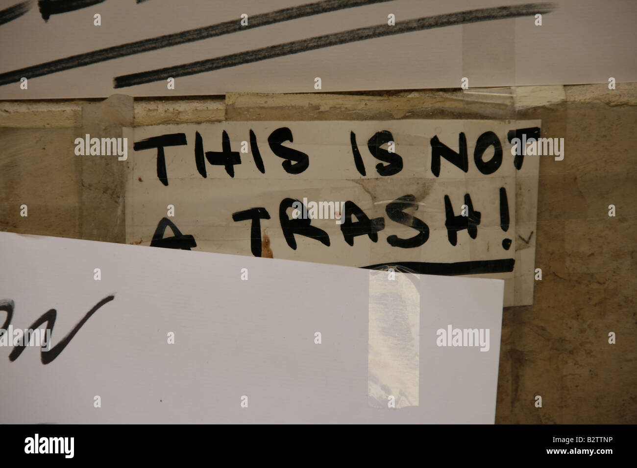 this is not trash message on wall Stock Photo - Alamy