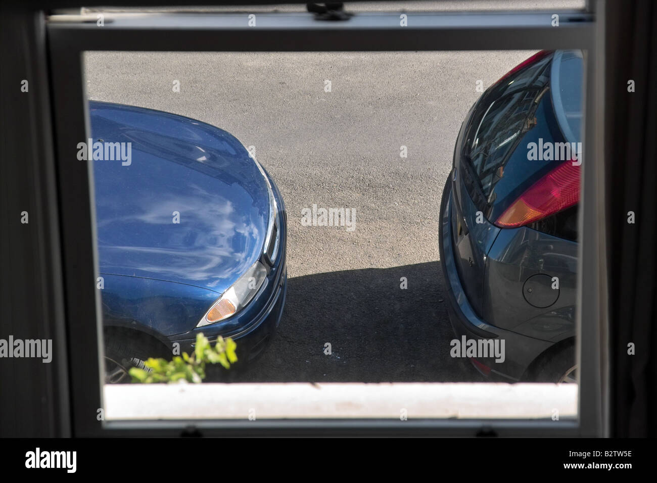 Cars through window Stock Photo - Alamy
