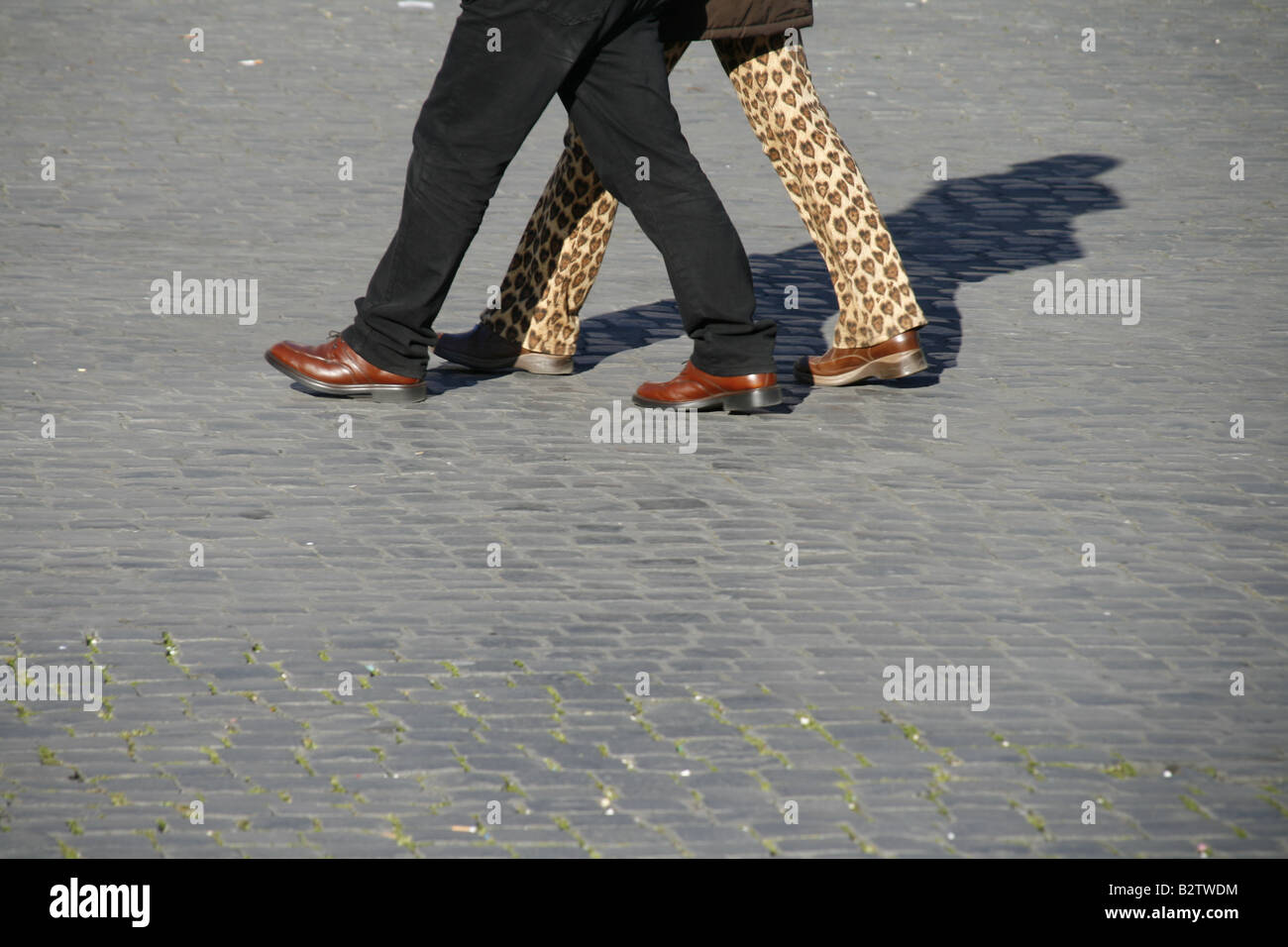 one person walking in street in city town Stock Photo - Alamy