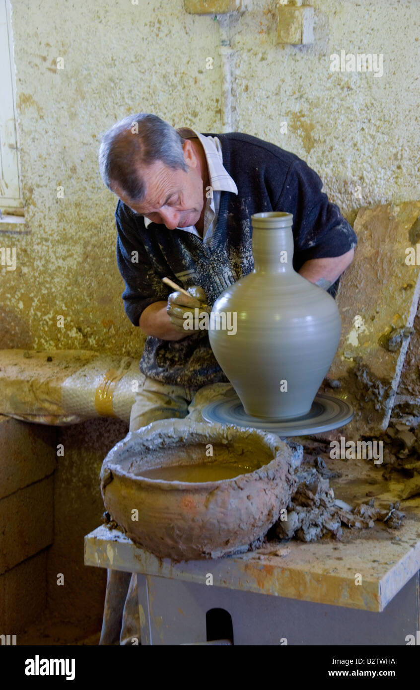 Potter working on jug at pottery Thrapsano on the Greek Mediterranean ...