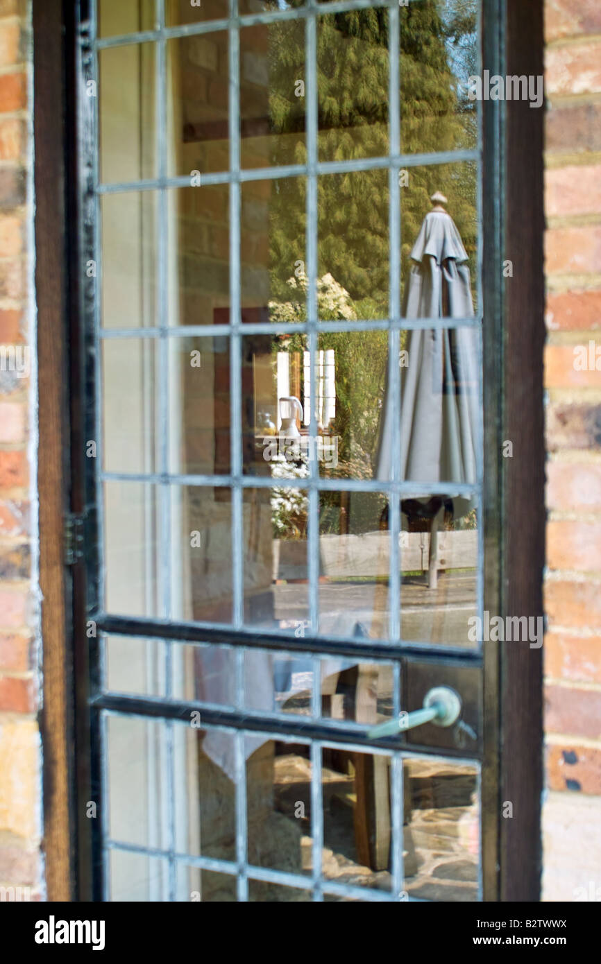 looking through leaded window, through house Stock Photo - Alamy