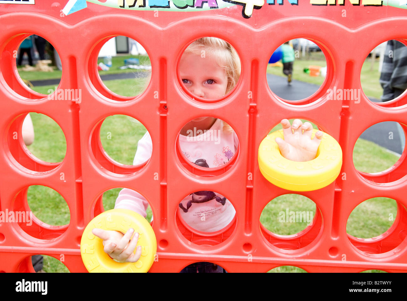 Childs game of four in line Stock Photo - Alamy