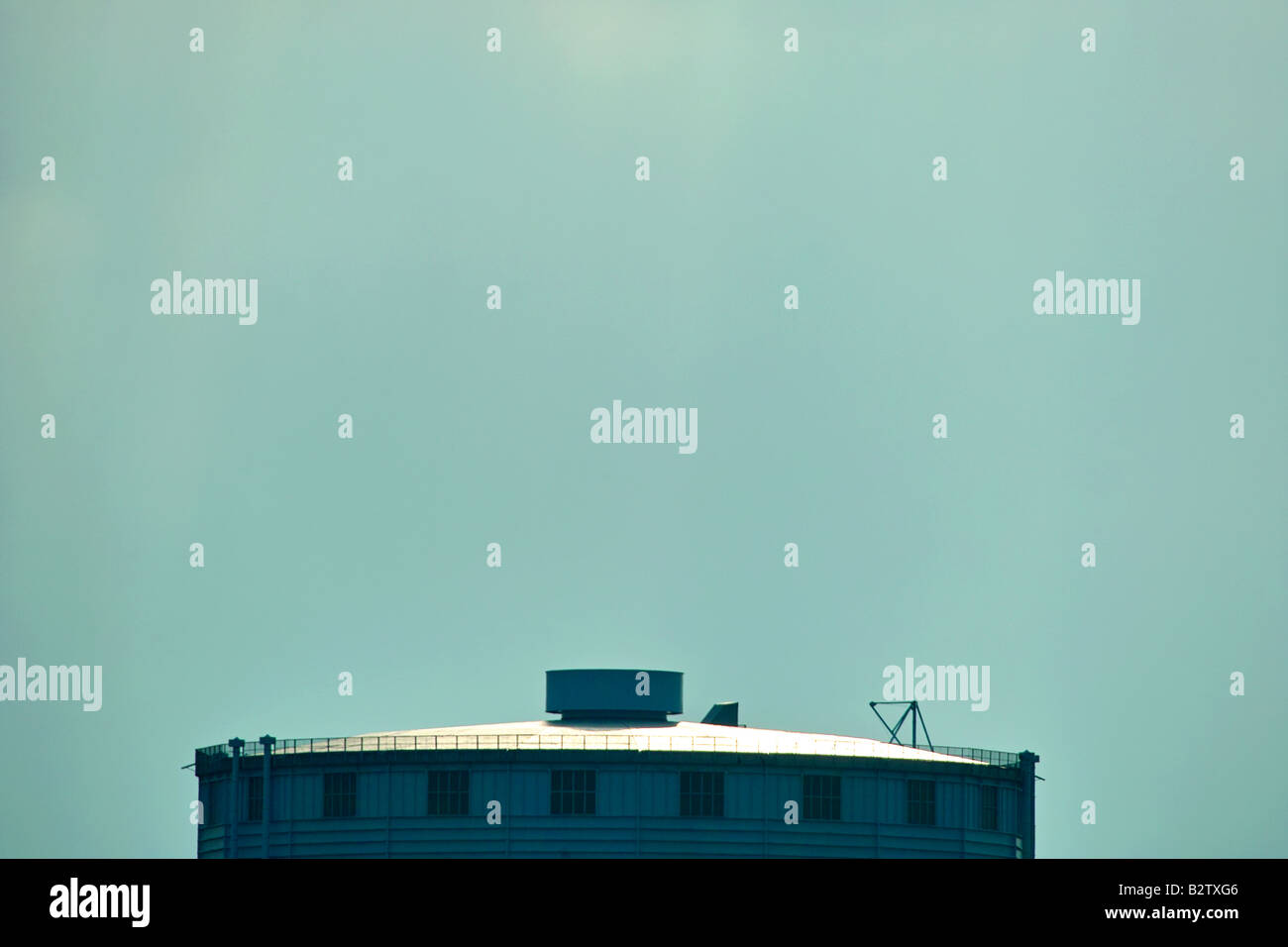 Gas storage tower Stock Photo - Alamy