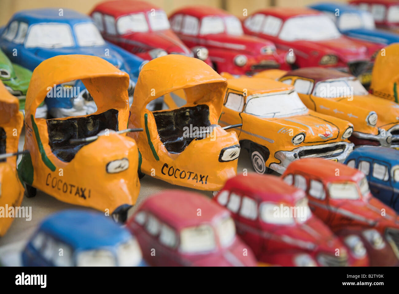 Models coco taxis and cars on display in the market in Havana, Habana ...