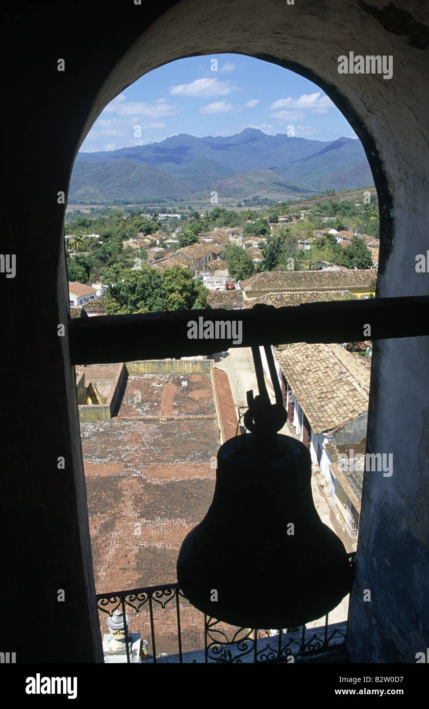 View from bell tower arch over rooftops of town Silhouette of church ...