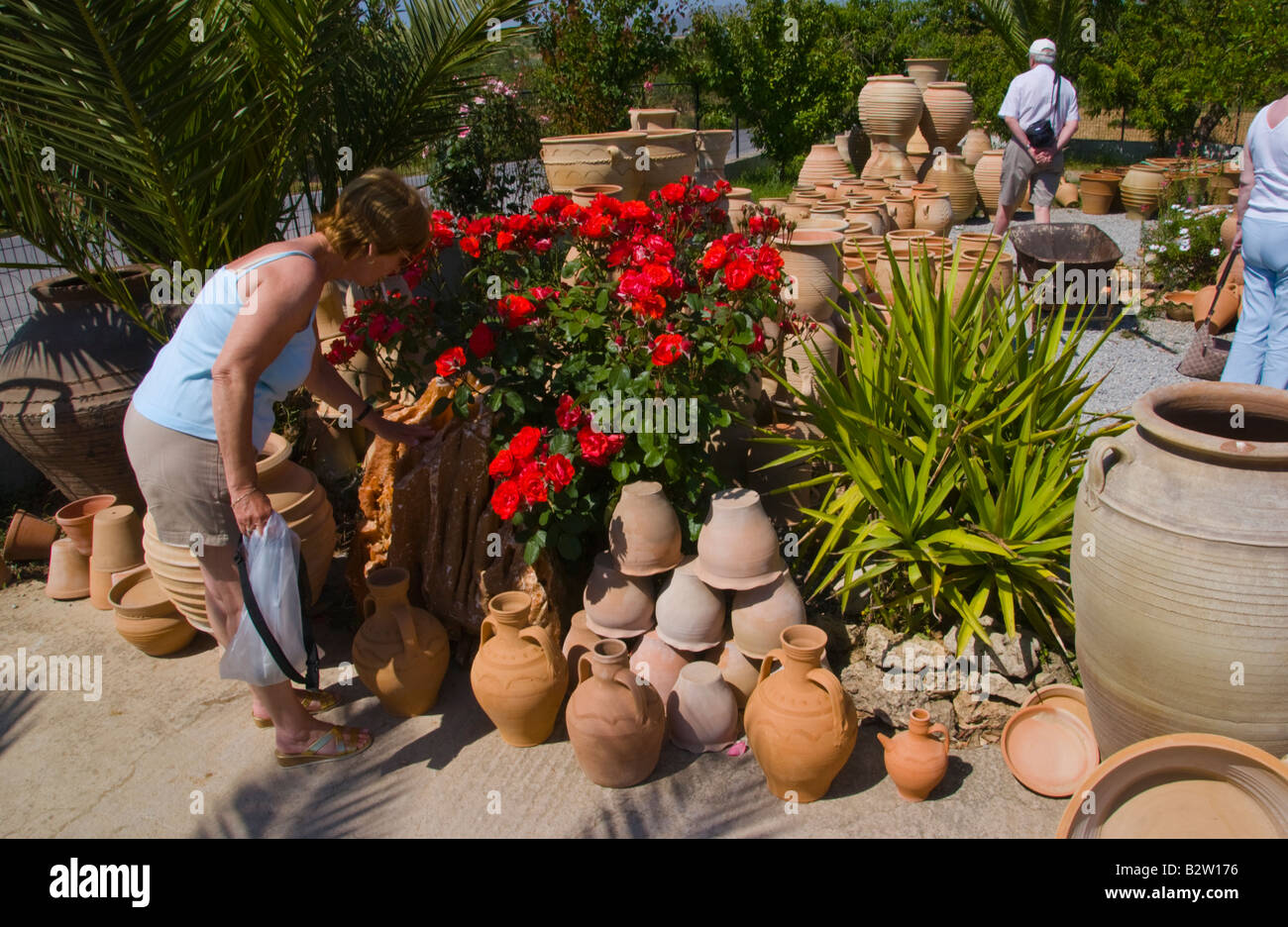 Women tourist browse pots for sale at pottery in Thrapsano on the Greek ...