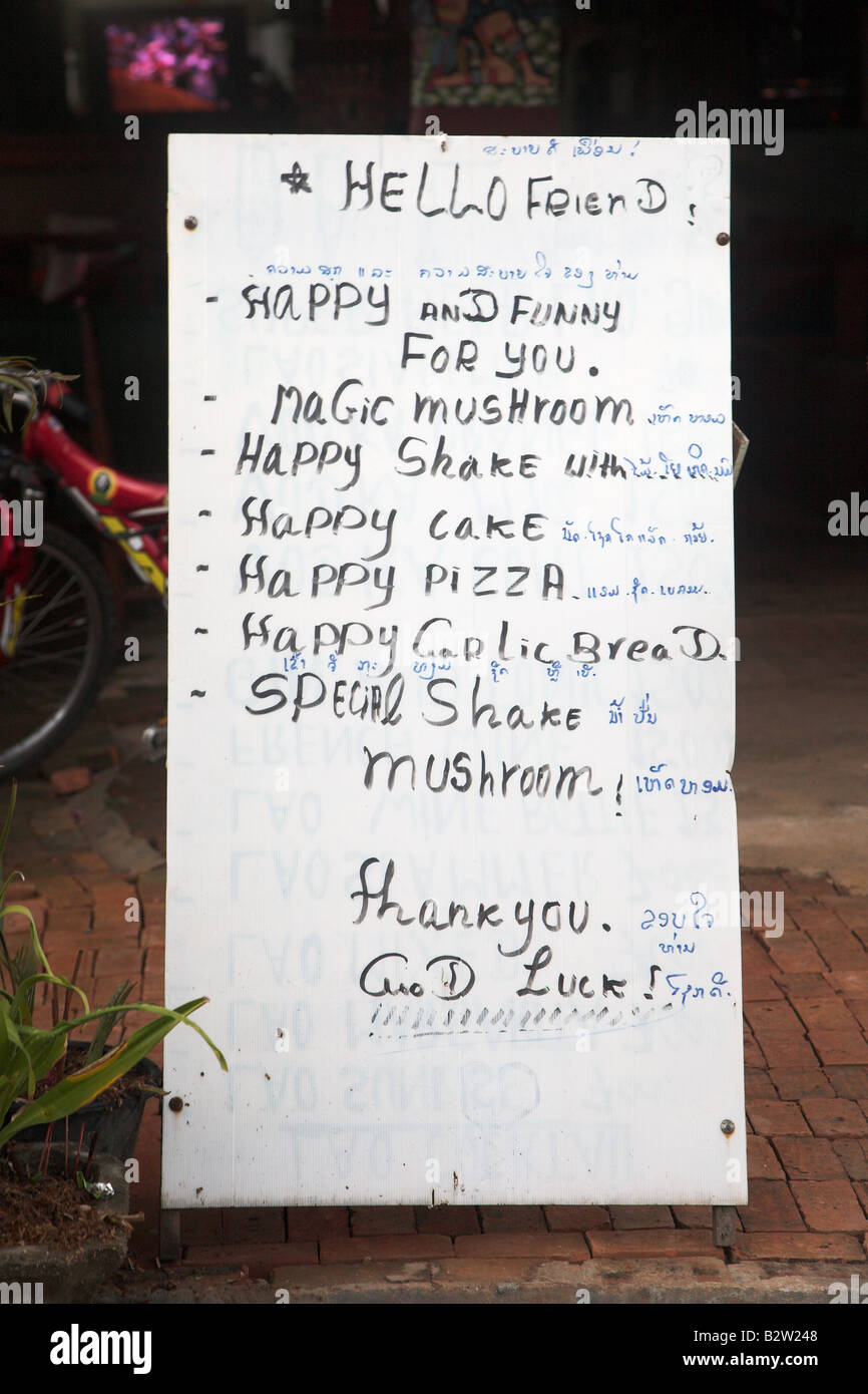 A menu outside of a tourist cafe, offering many "happy" items, of which ...