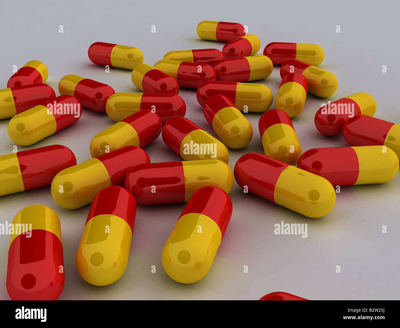 Yellow red medical capsules hi-res stock photography and images - Alamy