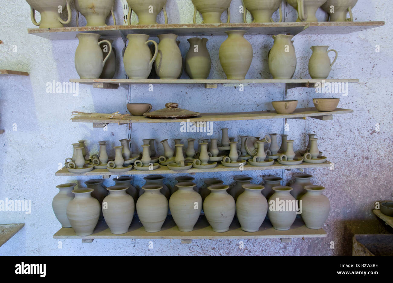 Pots ready for firing at pottery in Thrapsano on the Greek ...