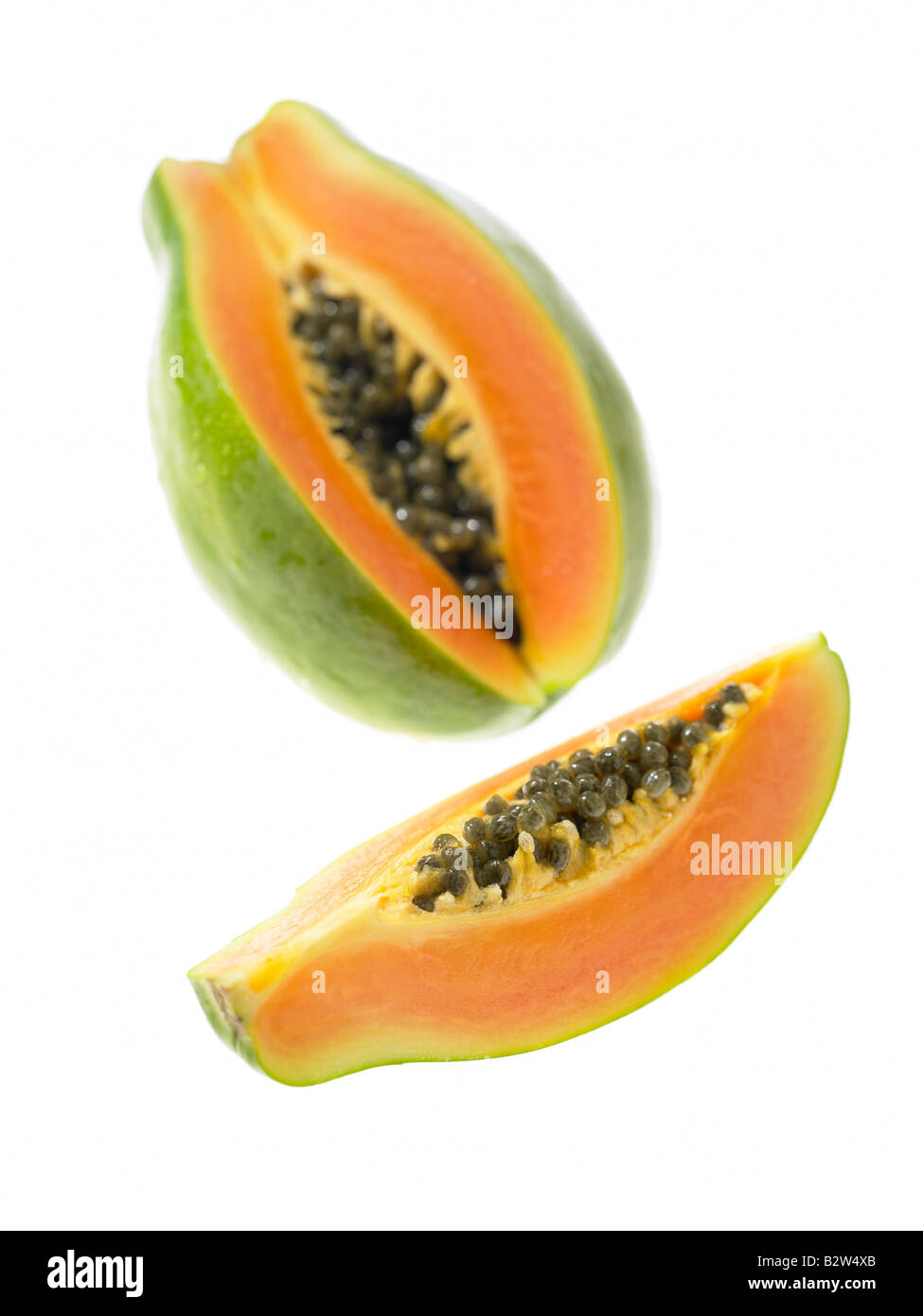 Two papayas Cut Out Stock Images & Pictures - Alamy