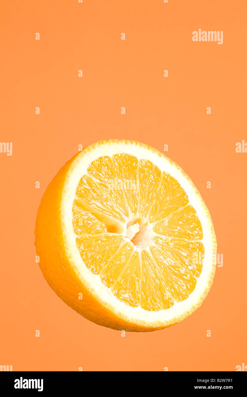 Half an orange Stock Photo - Alamy