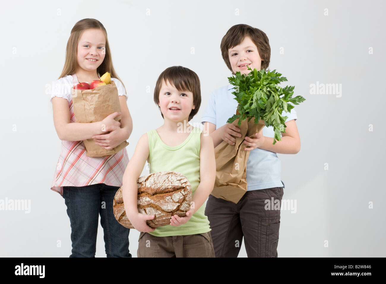 Children with groceries Stock Photo - Alamy