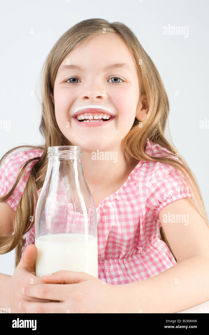 Girl with bottle of milk Stock Photo - Alamy