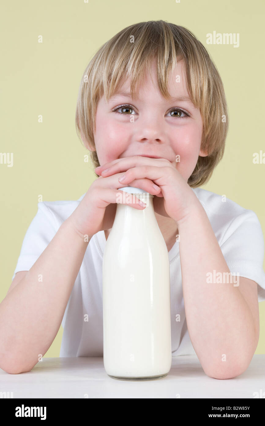 Boy with milk Stock Photo - Alamy
