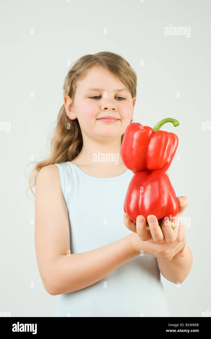 Girl balancing peppers Stock Photo - Alamy Girl balancing peppers Stock Photo - Alamy