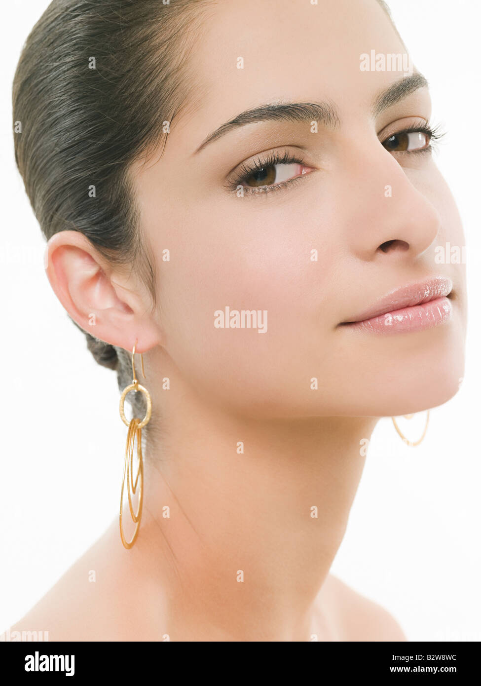 Woman wearing earrings Stock Photo - Alamy