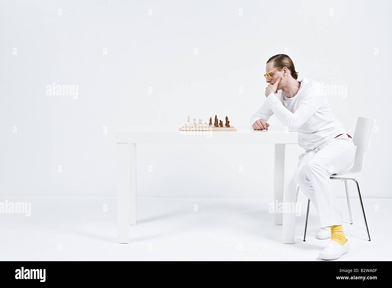 A man playing chess Stock Photo - Alamy