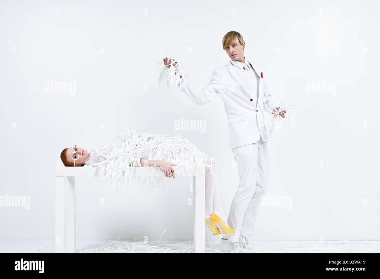 Woman standing over man lying down hi-res stock photography and images ...