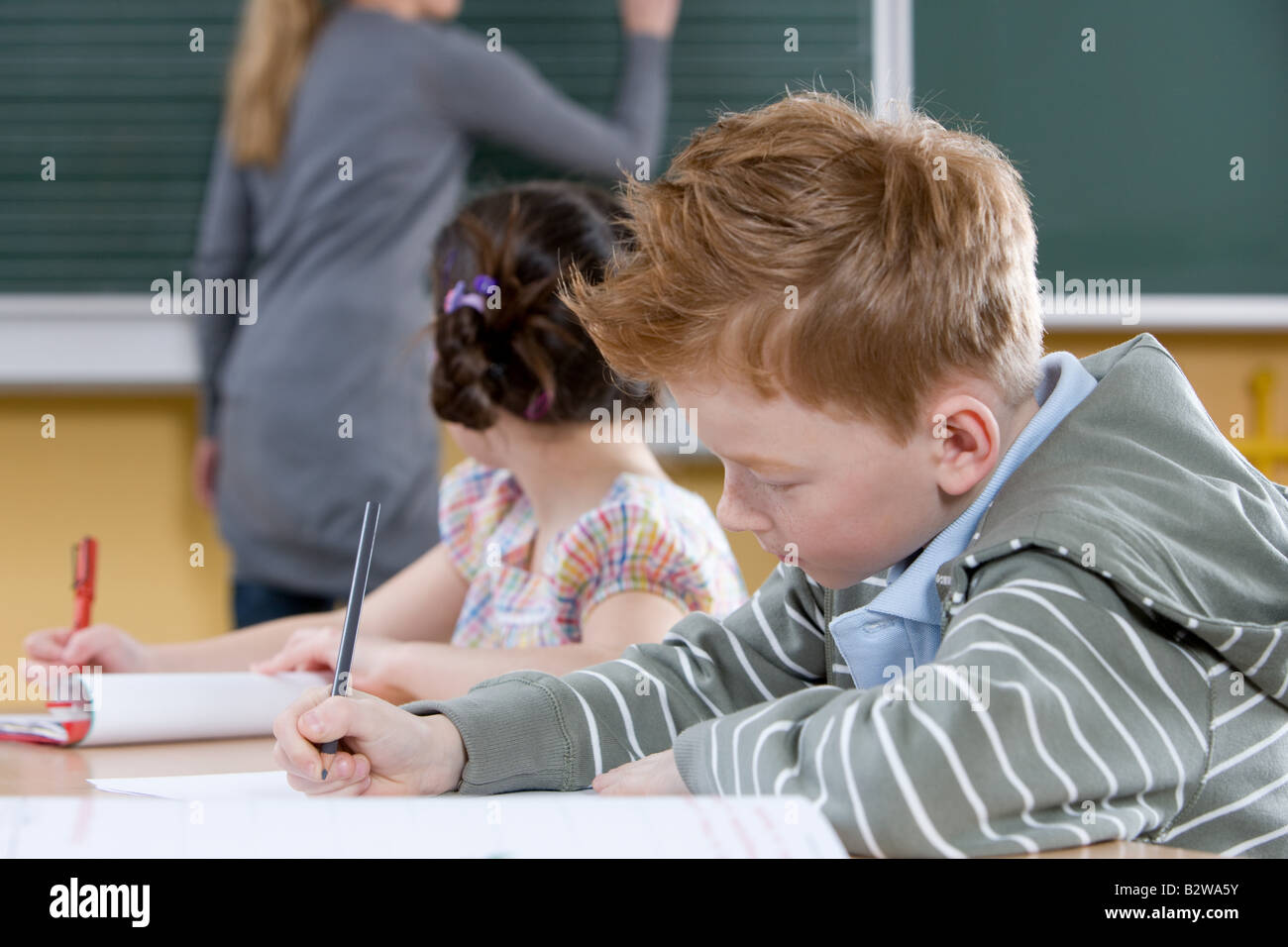 Children in class Stock Photo - Alamy