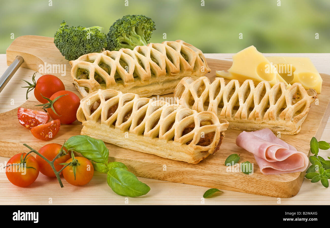 Lattice pastries with ham, cheese and tomato fillings Stock Photo - Alamy