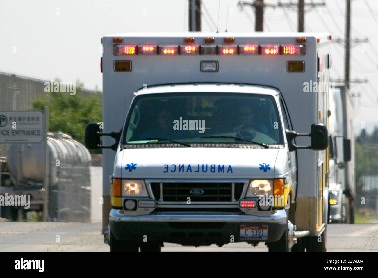 Ambulance in motion Stock Photo - Alamy
