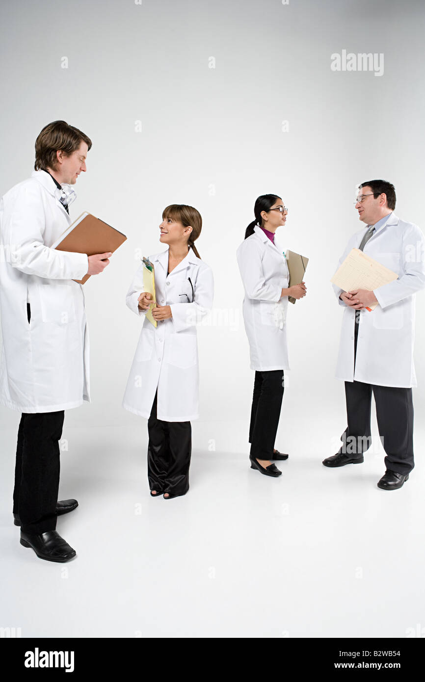 Four young scientists hi-res stock photography and images - Alamy