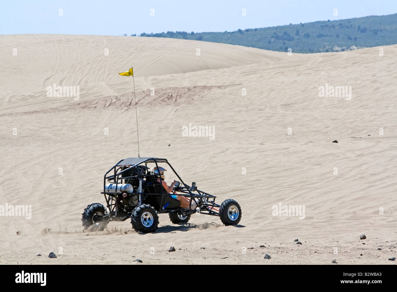 Dune buggy driving on sand dunes at St Anthony Idaho Stock Photo - Alamy