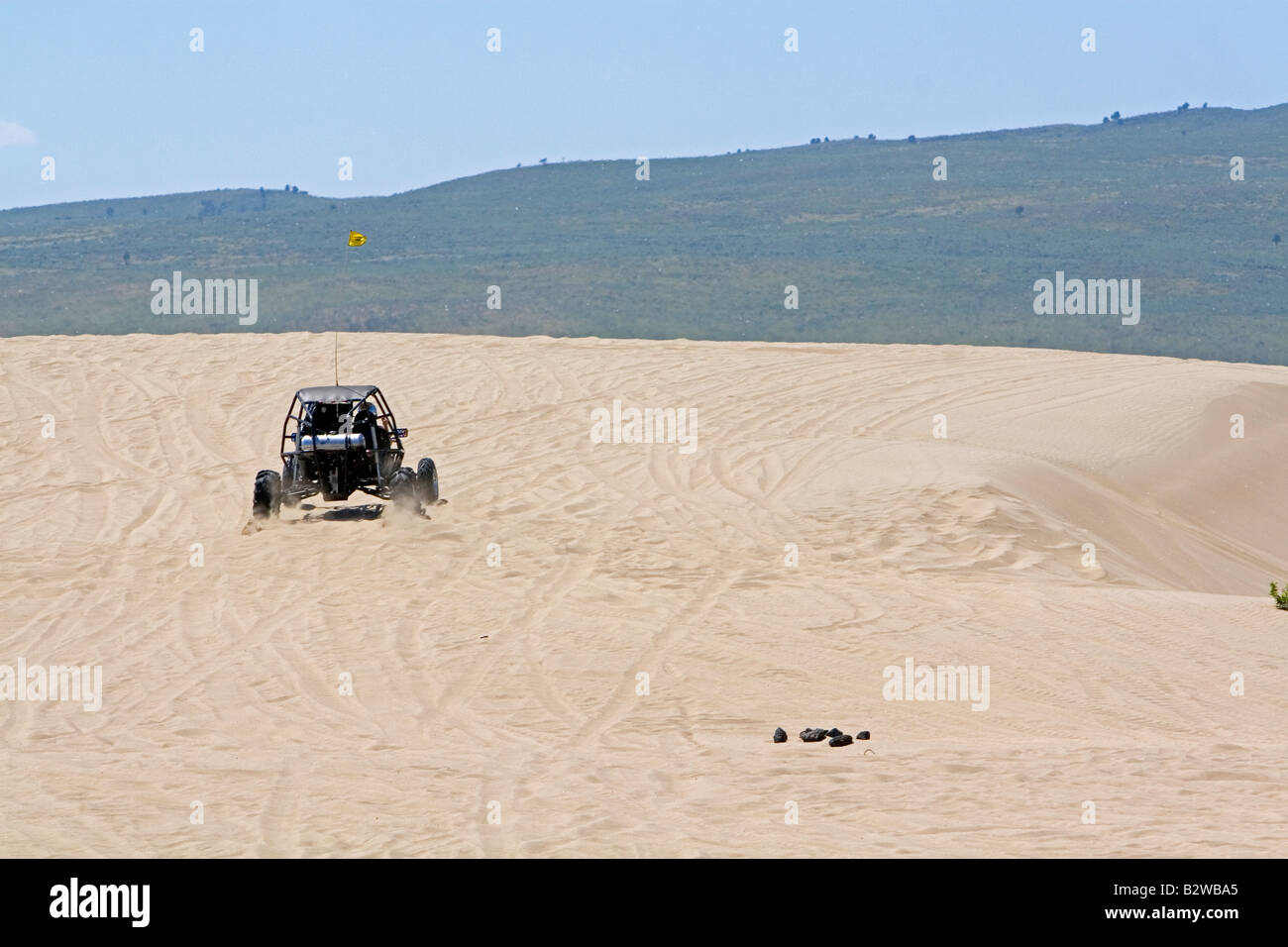 Dune buggy driving on sand dunes at St Anthony Idaho Stock Photo - Alamy