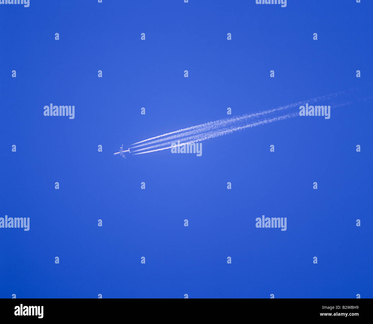 A vapour trail of a plane Stock Photo - Alamy