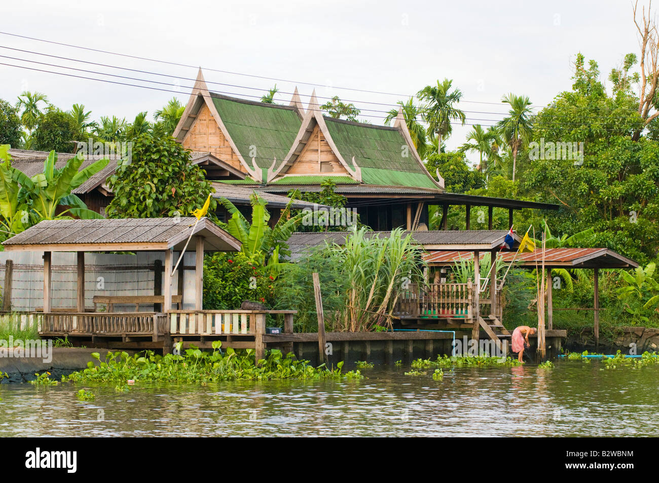 Traditional wooden Thai houses on stilts in Bangkok Stock Photo - Alamy
