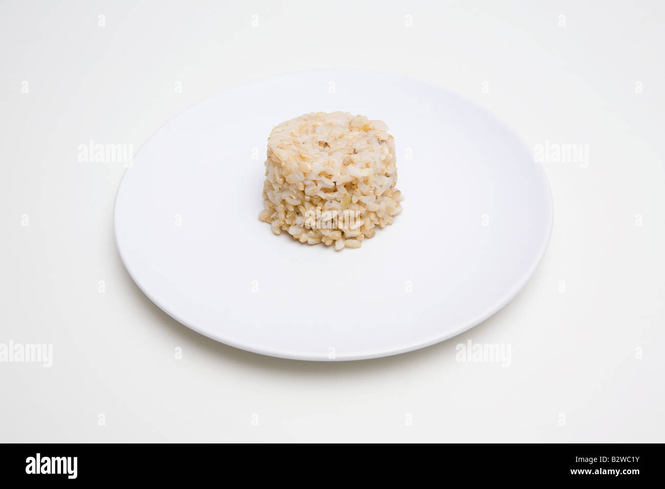 Stack of brown rice Stock Photo - Alamy