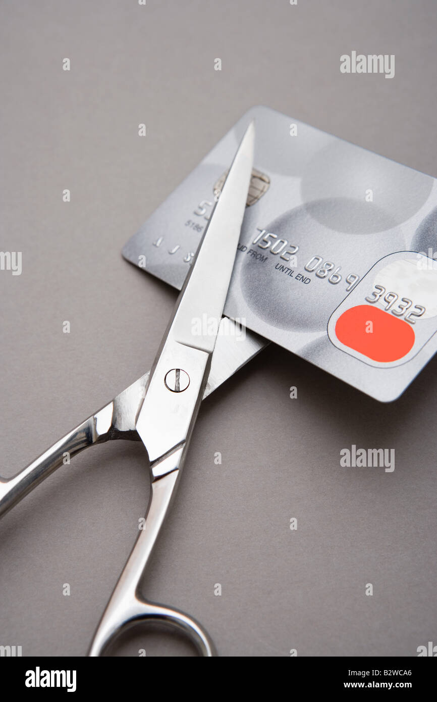 Credit card and scissors Stock Photo - Alamy