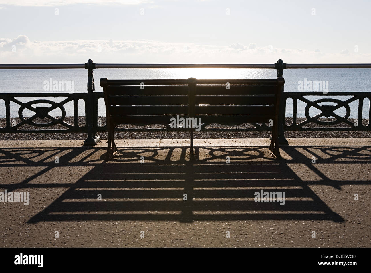A bench on a promenade Stock Photo - Alamy