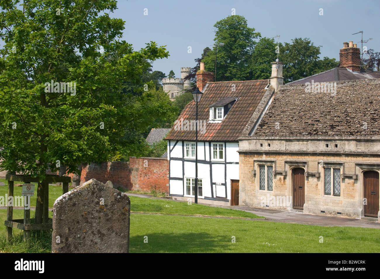 Old cottages alongside churchyard of St John's Church, Devizes ...