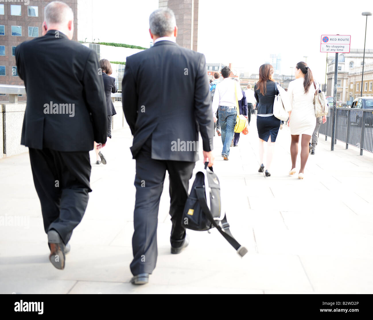 commuters walking over London bridge Stock Photo - Alamy