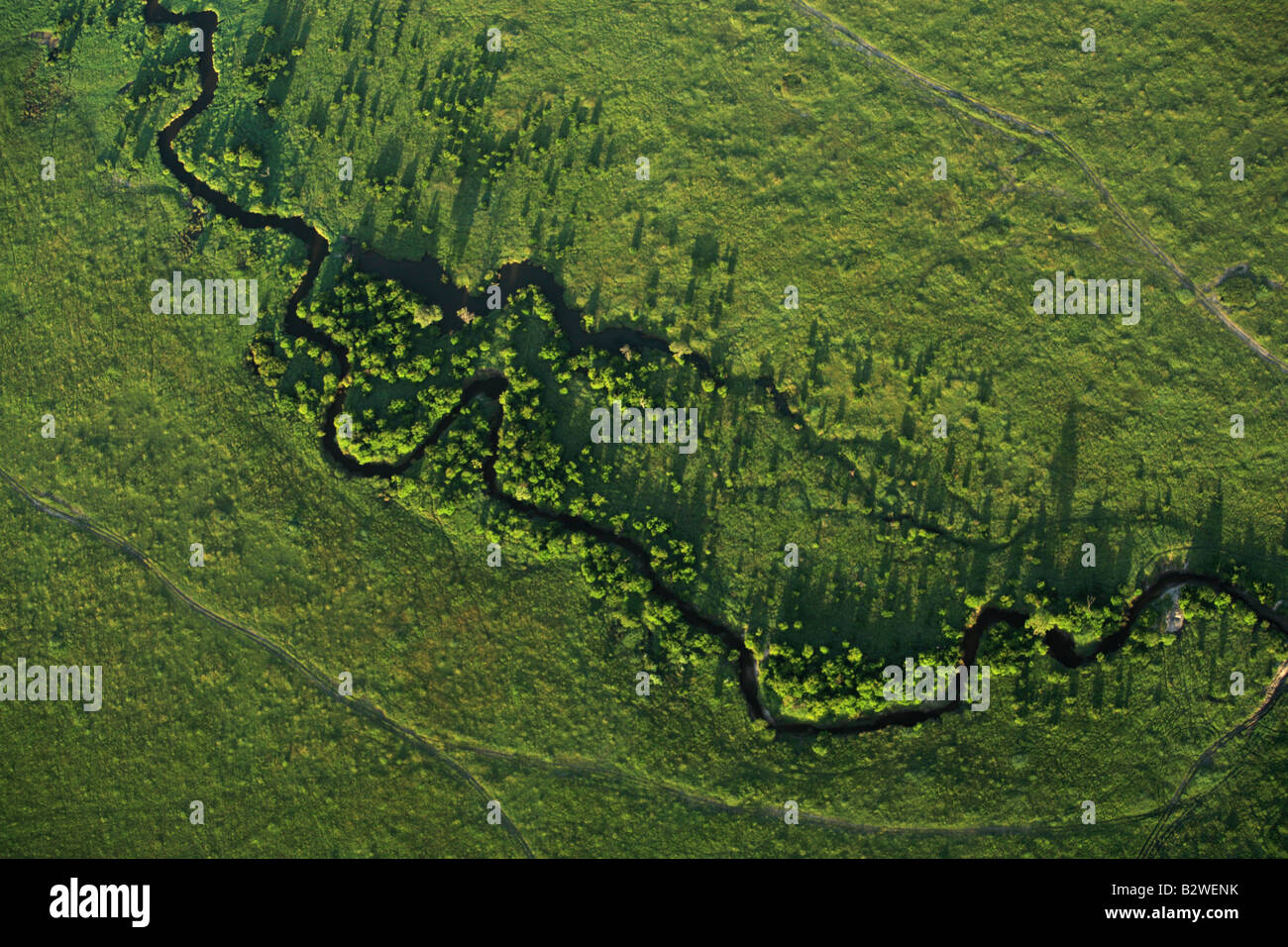 River meandering across Masai Mara Kenya Africa Stock Photo - Alamy