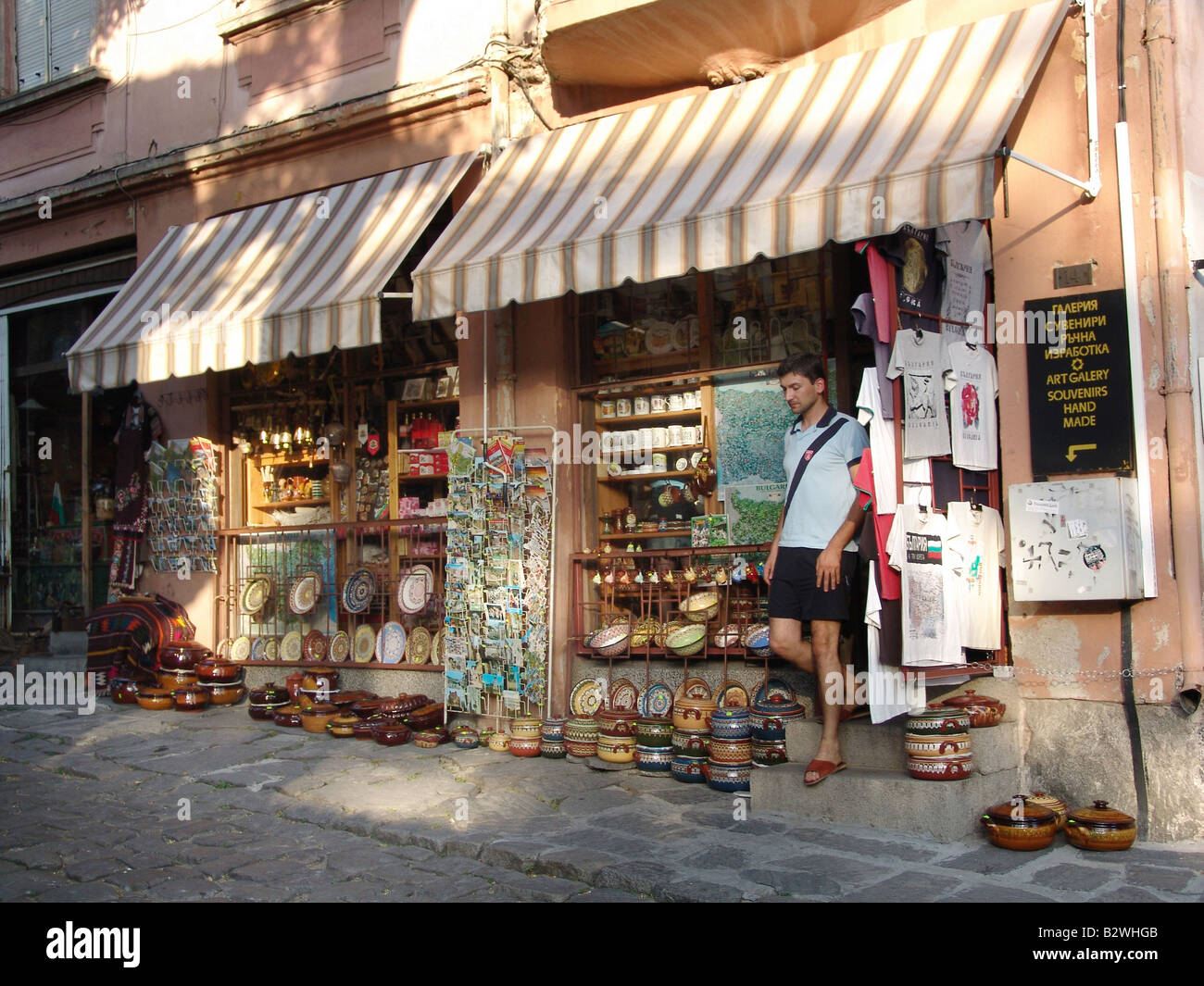 A tourist walking out a souvenir shop in Plovdiv, Bulgaria Stock Photo ...