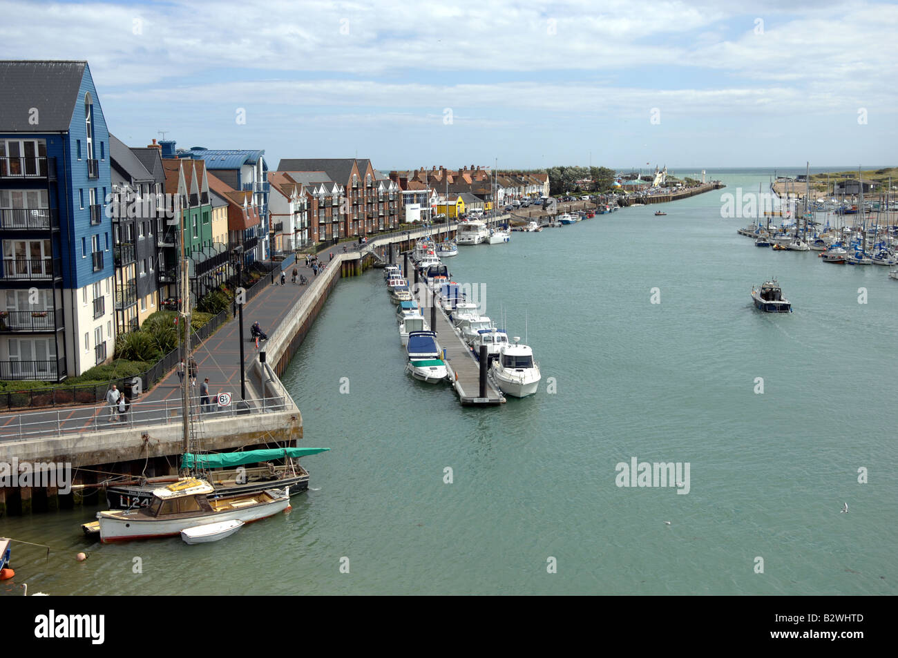 Littlehampton harbour entrance and riverside properties UK Stock Photo ...