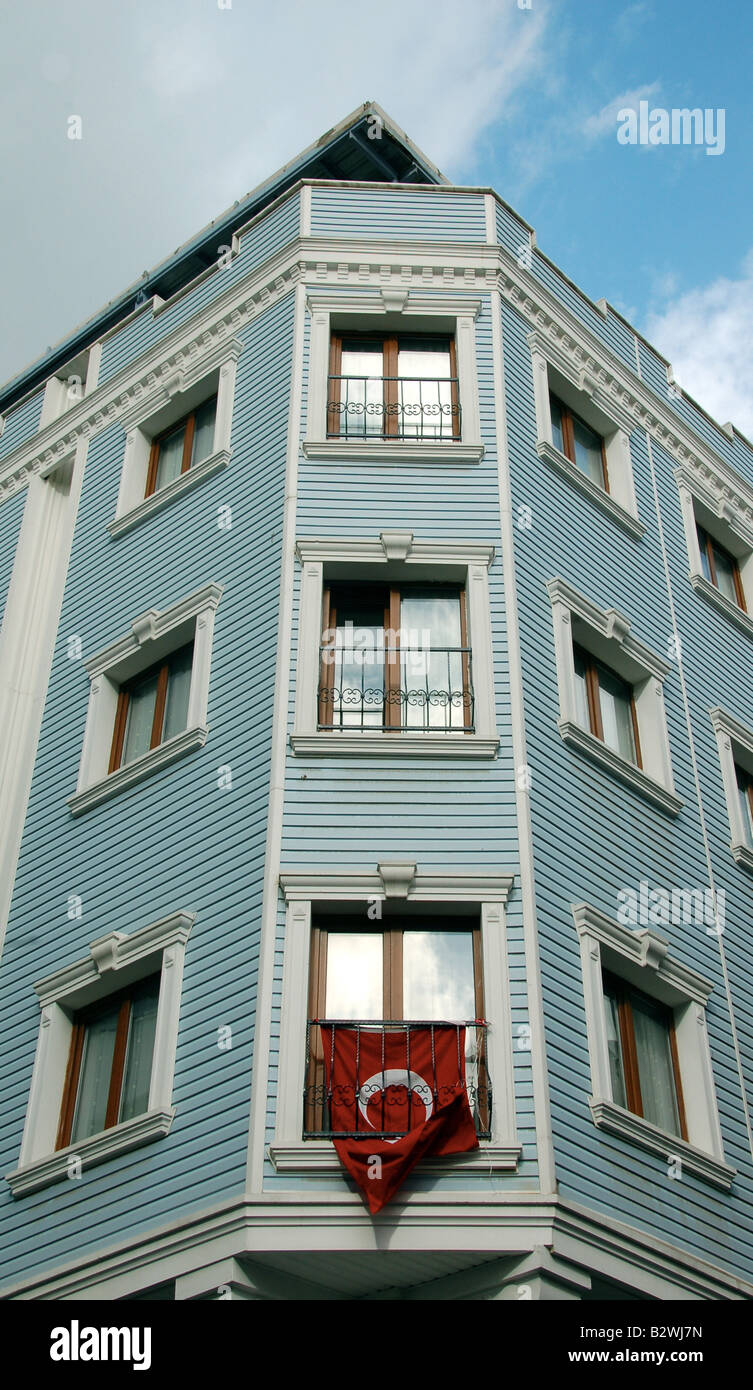 A modernized turquoise wooden-fronted building in the rustic ...