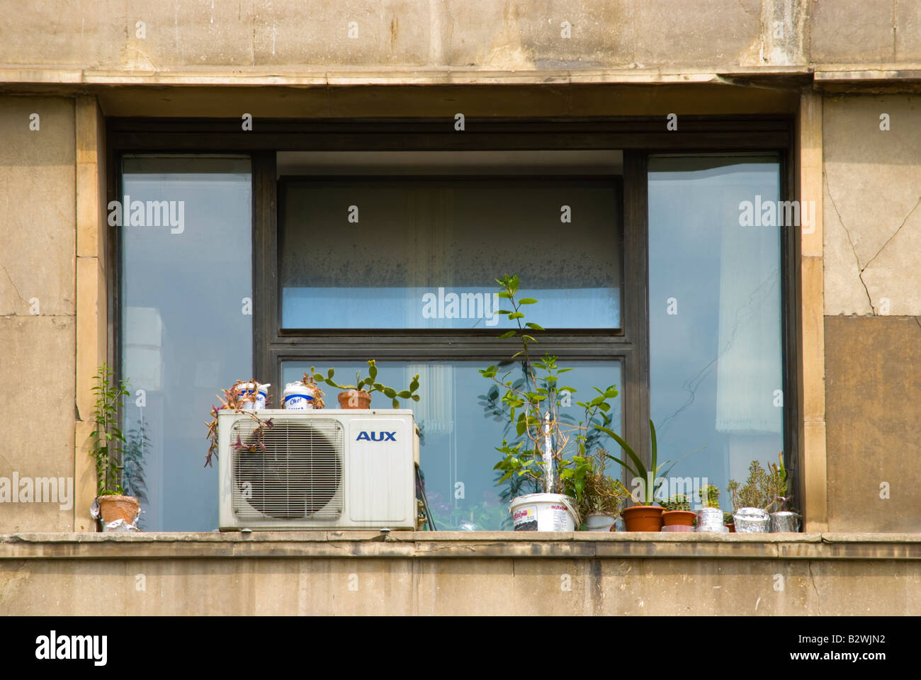 Window with an airconditioner and flowers in Bucharest Romania Europe ...