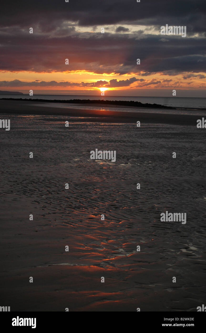 Dark and moody sunset over the sea Stock Photo - Alamy