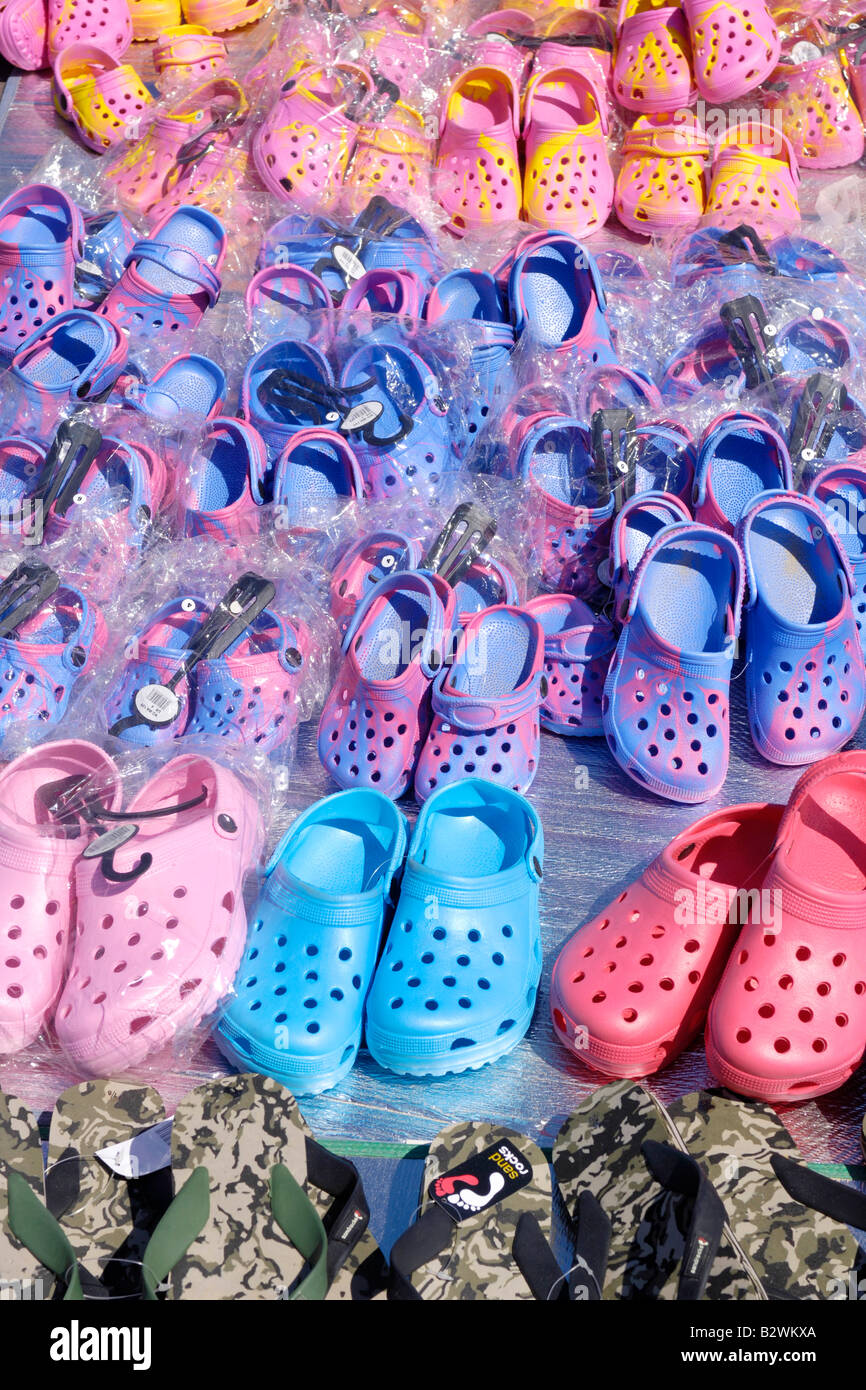 Brightly colored plastic shoes Stock Photo - Alamy