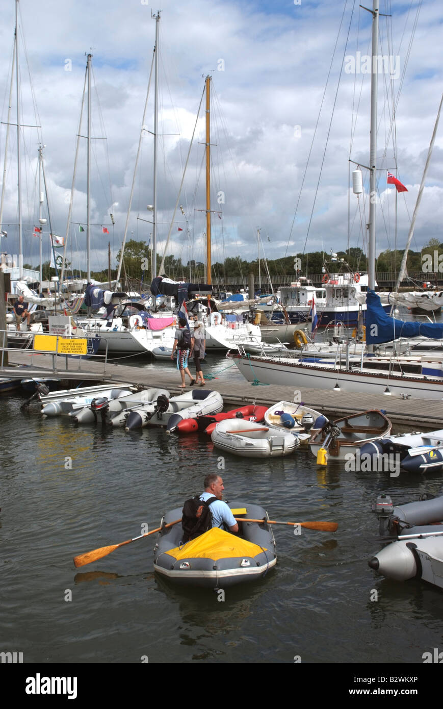 Sailing activity on the town quay at Lymington Hampshire England a ...