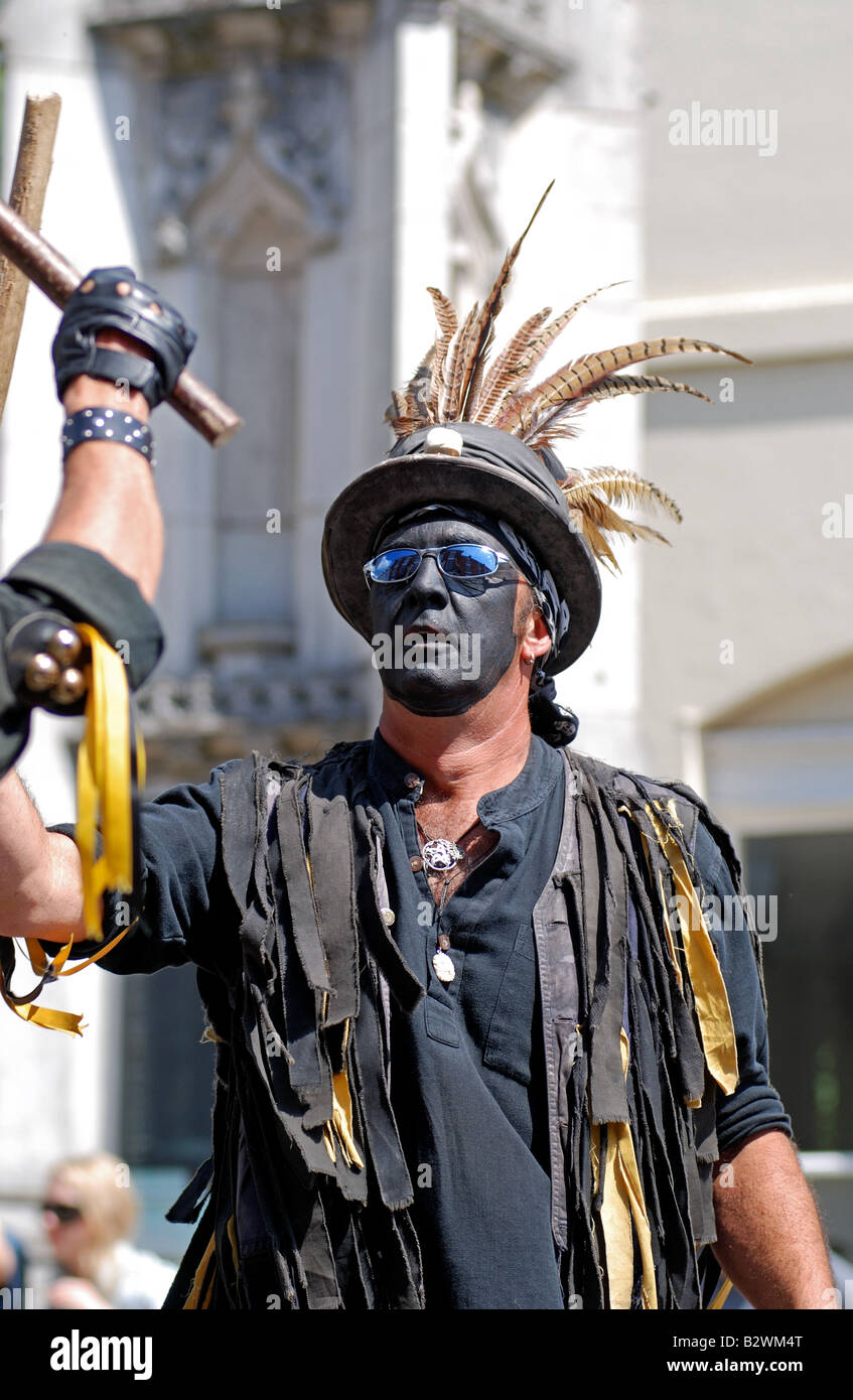 Black faced mummer dancing at Warwick Folk Festival 2008 UK Stock Photo ...