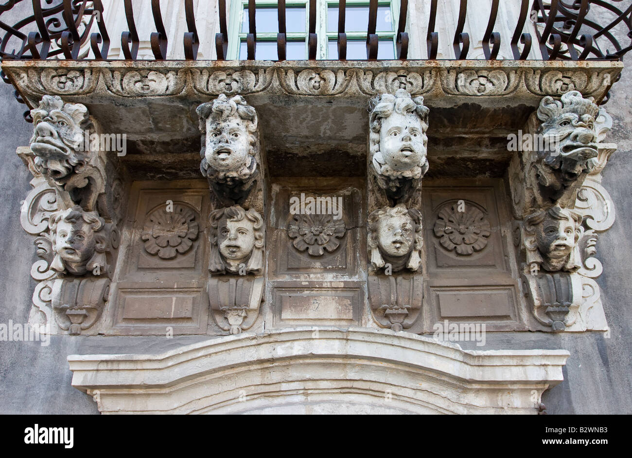 Balcony Gargoyles: A double row of heads are carved into this elaborate ...