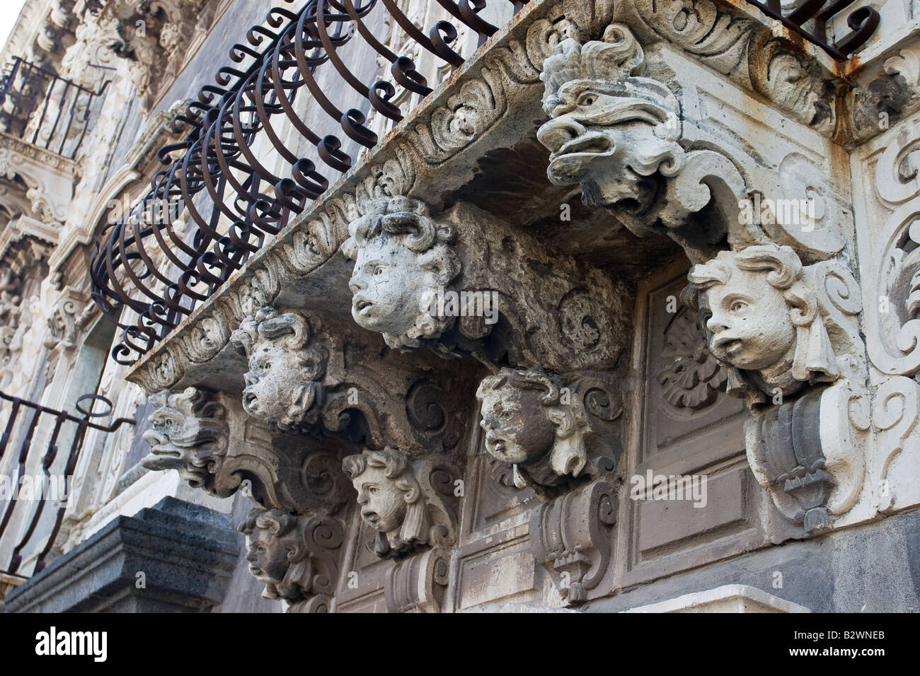 Balcony Gargoyles oblique: A double row of heads are carved into this ...