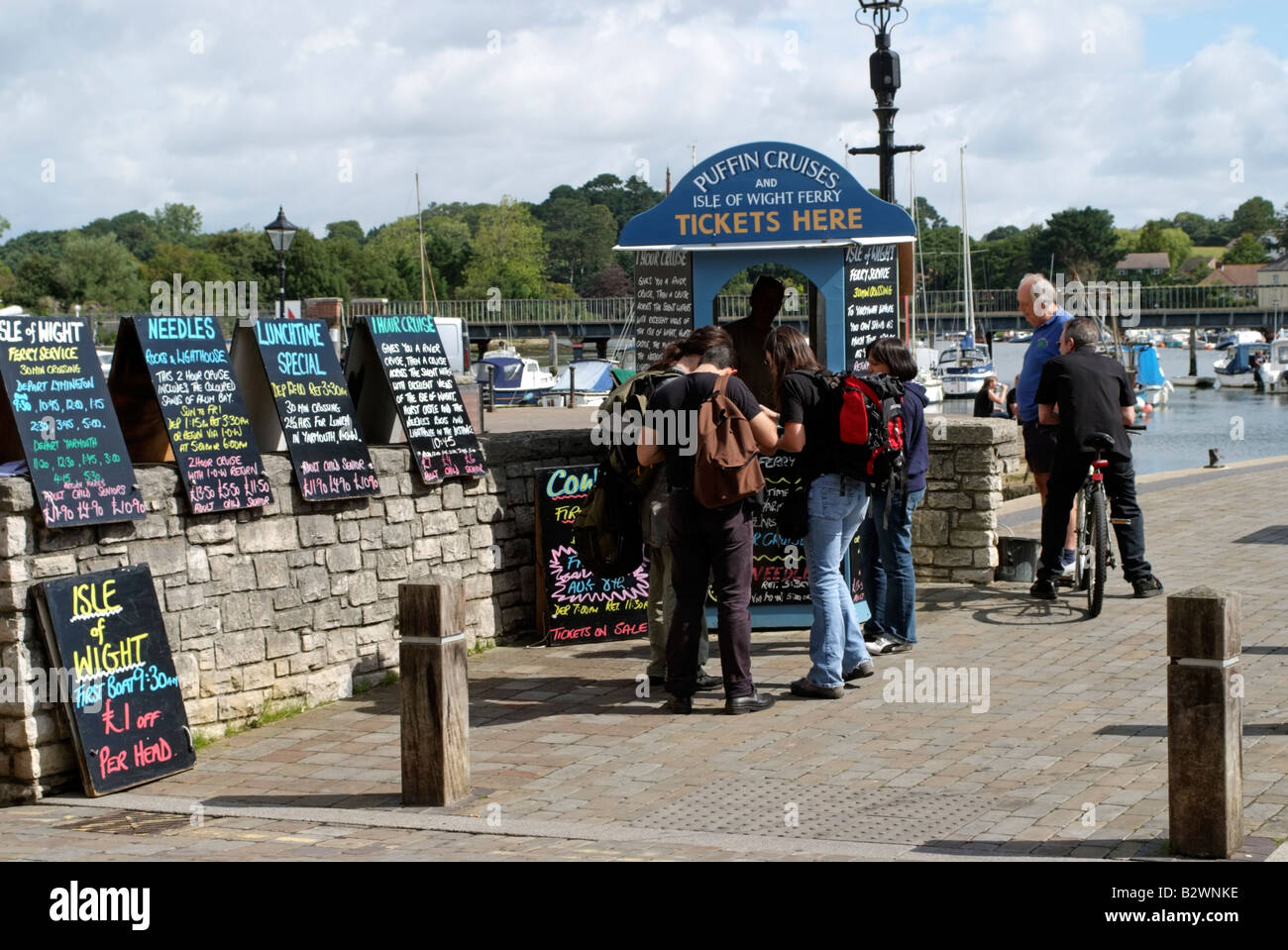 Lymington town quay boat trip tourists at booking office Hamshire ...