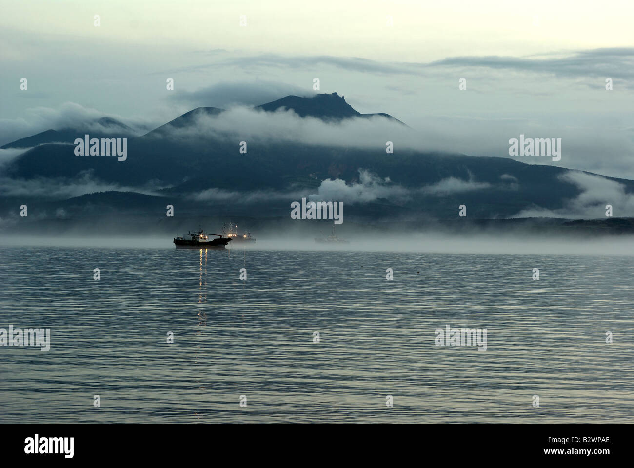 Ships in harbor at Yuzhno Kurilsk; Kunashir Island; chain of Kurils ...